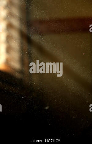 Dust in sunbeam through home window Stock Photo - Alamy