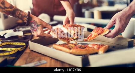 Pizza Sharing Togetherness Friendship Community Concept Stock Photo - Alamy