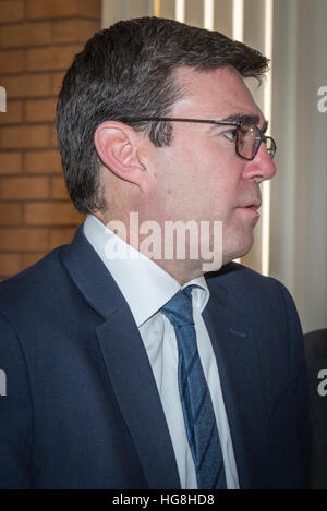 Mayor of Greater Manchester Andy Burnham talks to staff during his ...