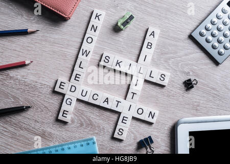 Conceptual business keywords on table with elements of game making ...