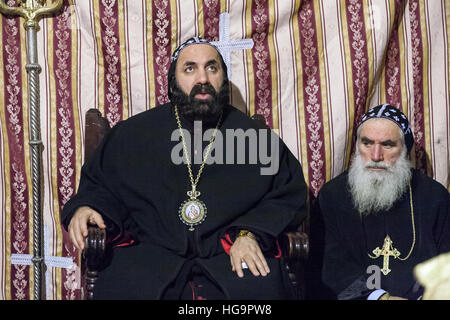Jerusalem, Israel - January 2, 2011: Syrian Orthodox priest holds ...