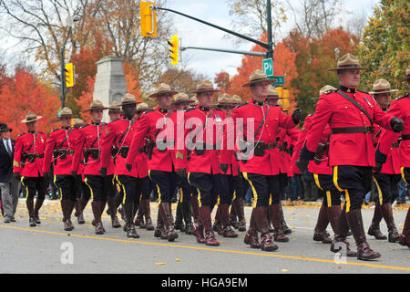 Canadian Mounties marching after a remembrance ceremony in London ...