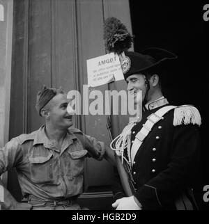 Two Italian Carabinieri in full dress uniform pose for the camera on a ...