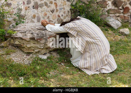 Jesus in agony praying in the garden of olives before his crucifixion ...