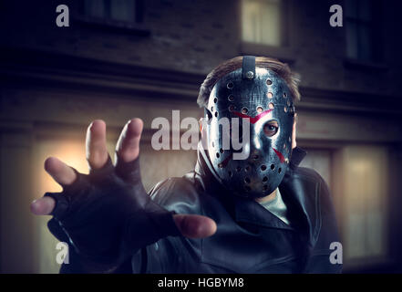 one man serial killer with mask portrait in silhouette studio isolated ...