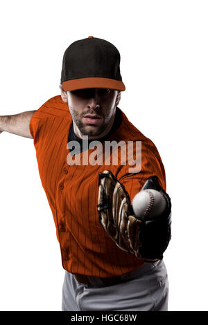 Baseball Player with a orange uniform on baseball Stadium Stock Photo ...