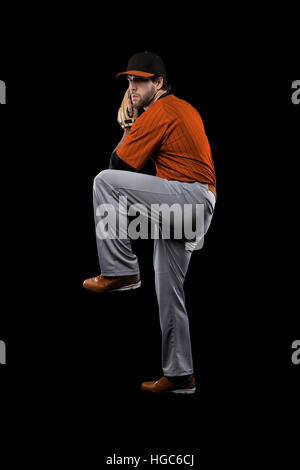Pitcher Baseball Player with a orange uniform coming out of a blast of ...