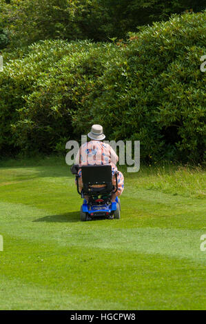 Fat woman on invalid cart Stock Photo - Alamy