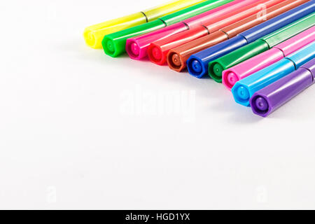 Colorful markers on white background. With beautiful vibrant colors ...