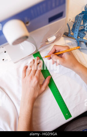 Girl makes pattern top view Stock Photo - Alamy