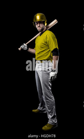 Baseball Player on a Yellow Uniform on baseball Stadium Stock Photo - Alamy
