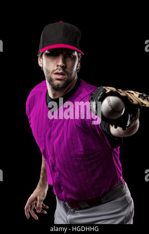 Baseball Player with a pink uniform on baseball Stadium Stock Photo - Alamy