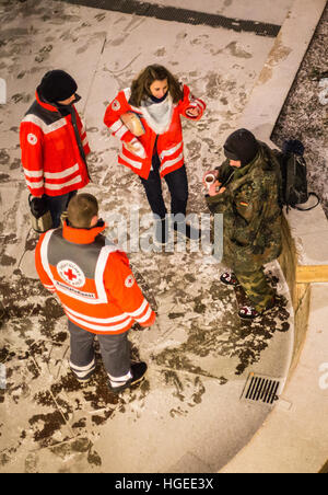 Stuttgart, Germany. 8th Jan, 2017. Volunteers of the German Red Cross ...