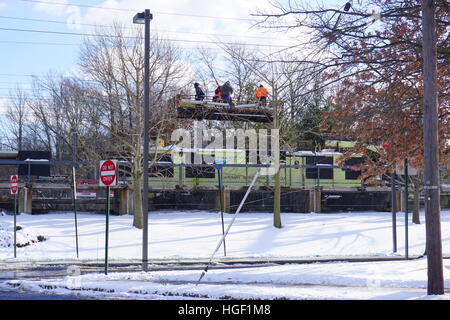 An Amtrak Catenary Maintenance Vehicle repairs damaged infrastructure ...