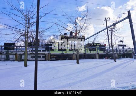 An Amtrak Catenary Maintenance Vehicle repairs damaged infrastructure ...