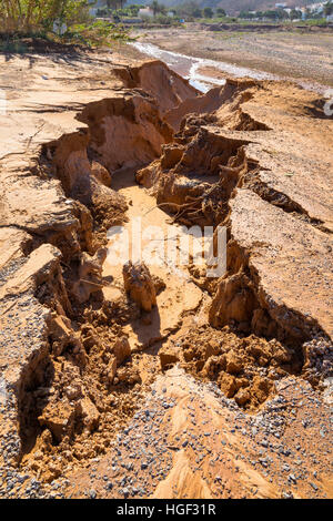 View of soil erosion. Rain water streams made bizarre shapes of clay ...