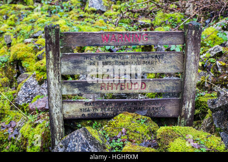 Warning sign at entrance to cave Porth yr Ogof Brecon beacons national ...