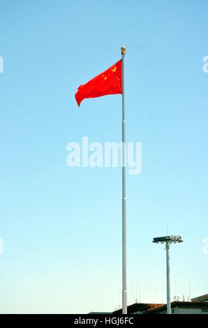 Chinese national flags flutter on the windows at the campus of Liaoning ...