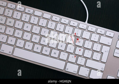 Blood on a computer keyboard Stock Photo - Alamy