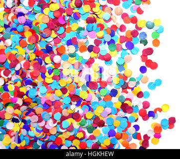 colorful assorted confetti on white background. red, blue, green ...