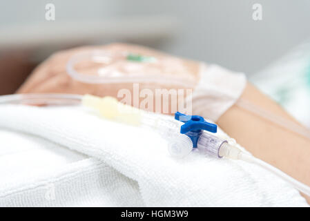 Close-up IV needle on patient in the hospital Stock Photo - Alamy
