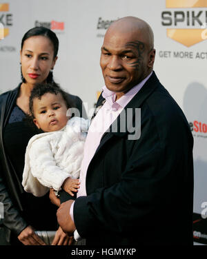 Mike Tyson, his wife, Lakiha Spicer, and their daughter, Milan Tyson ...