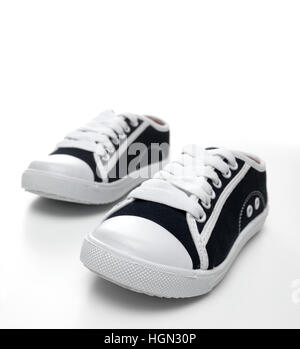 pair of sport trainers isolated on white background Stock Photo - Alamy
