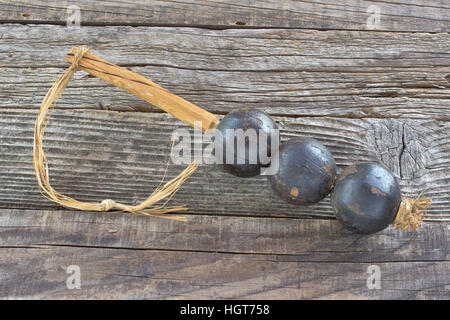 African Rattle from Zimbabwe on wooden background Stock Photo - Alamy