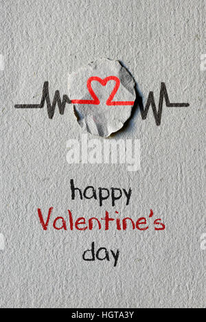 Red paper with message for Valentine's day and hearts on wooden table ...