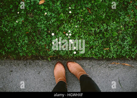 looking down at feet and grass Stock Photo - Alamy