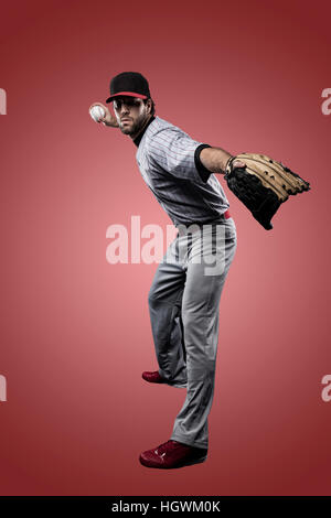 Pitcher Baseball Player with a red uniform on baseball Stadium Stock ...