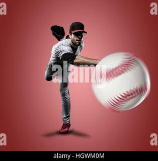 Pitcher Baseball Player with a red uniform on baseball Stadium Stock ...