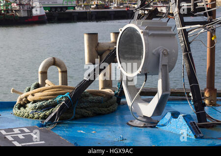 Close up shots of a small trawler mast with navigation lights, ropes ...