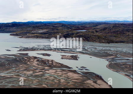 An outwash plain created by a river flowing with meltwater and sediment ...