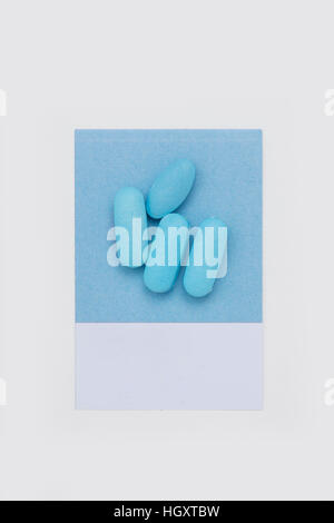 Blue pills on pastel background. Template for feminine beauty blog ...