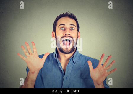 Happy young man going crazy screaming super excited. Portrait ecstatic ...
