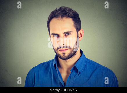 suspicious dubious man skeptic look peep out Stock Photo - Alamy