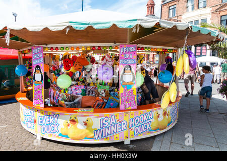 Hook a duck stall, with prizes, funfair Brighton East Sussex UK Stock ...