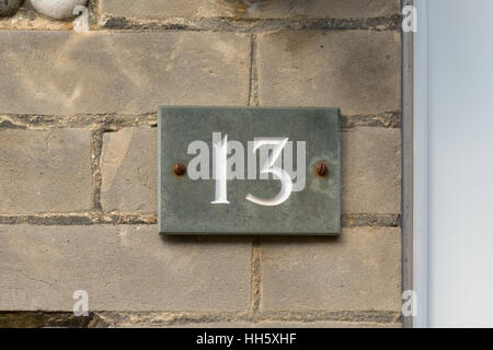 number 13 sign on the wall, bad luck concept Stock Photo - Alamy