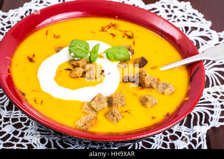 Spiced carrot puree with croutons Stock Photo - Alamy