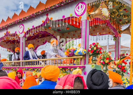 Colourful Parade float carrying the holy scripture, Guru Granth Sahib ...