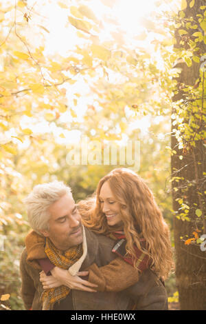Happy couple enjoying golden autumn spring season in the park Stock ...