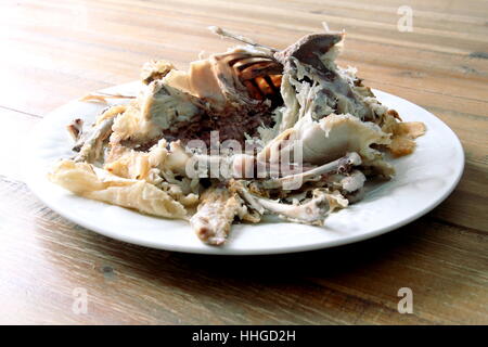 A half-eaten roast chicken carcass Stock Photo - Alamy