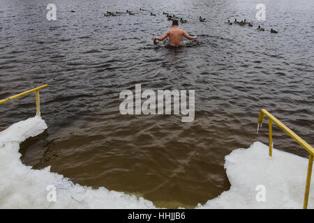 Kiev, Ukraine. 19th Jan, 2017. Ukrainian Orthodox believers bathe in ...
