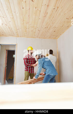 woman and man as artisan team at craftsman workshop Stock Photo - Alamy