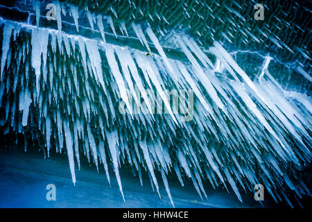 Lot of sharp and long icicles Stock Photo - Alamy