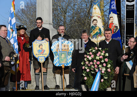 Royalists carrying flags showing the likeness of King Ludwig II walk ...