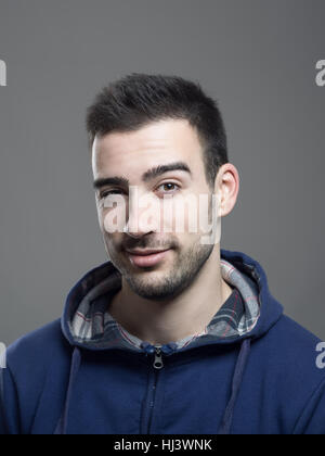 Portrait of attractive cheerful funky childish long-haired guy ...