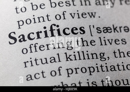 Dictionary word sacrifice Stock Photo - Alamy