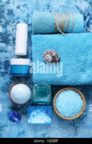 Spa concept turquoise - soap, salt, cream, towel Stock Photo - Alamy